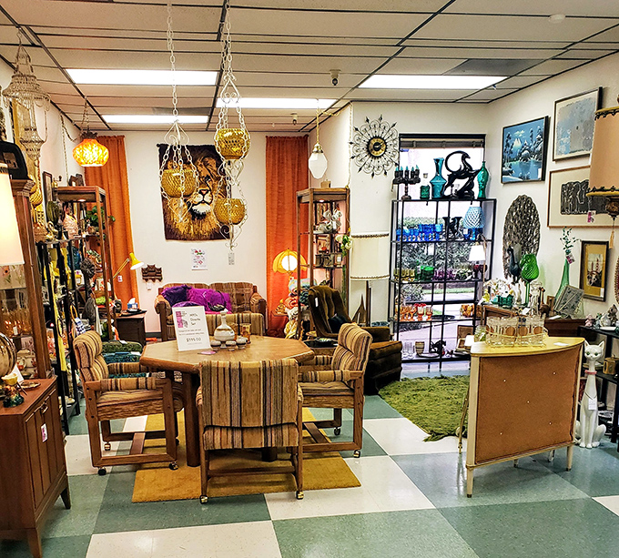 Mid-century living room dreams come alive in this vignette. That striped dining set is practically begging for a fondue party and Sinatra on vinyl.