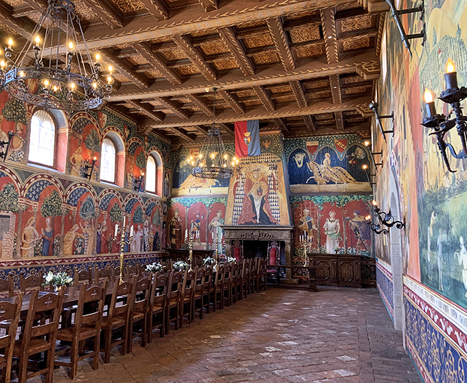Dining in this Great Hall feels like you've crashed a medieval royal feast. The frescoes tell stories while the wooden beams have supported centuries of imaginary banquets.