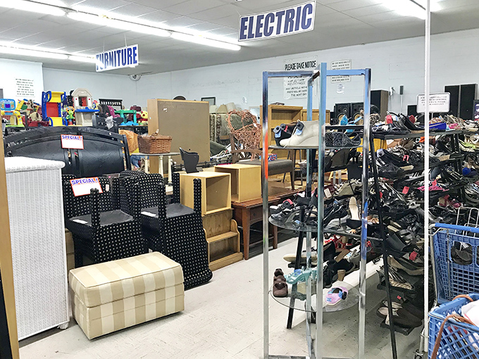 The "Electric" and "Furniture" signs hover like retail deities over this wonderland of second chances, where yesterday's chairs meet tomorrow's homes.