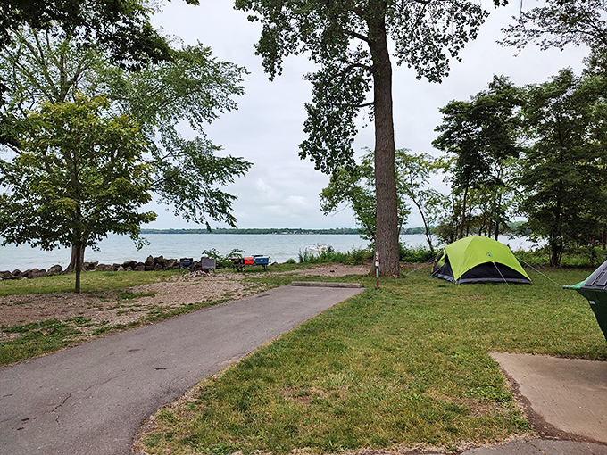 Camping with a view that beats any five-star hotel. Wake up, unzip, and boom&mdash;Lake Erie says good morning before your coffee does. 