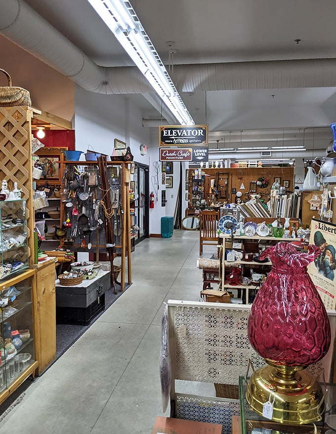 That red glass lamp could have illuminated Gatsby's library, while the elevator sign points to even more floors of vintage wonders.