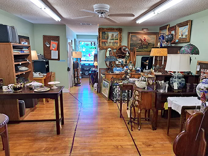 Oriental rugs guide you through narrow passageways where every turn reveals another dealer's carefully curated collection of memories.