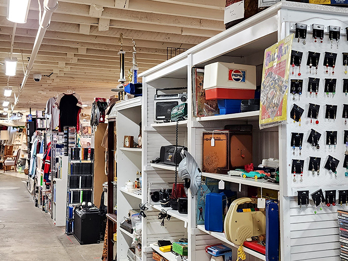 Vendor booths create a colorful patchwork of decades past, where vintage clothing hangs like ghosts of fashion trends that are somehow becoming cool again.