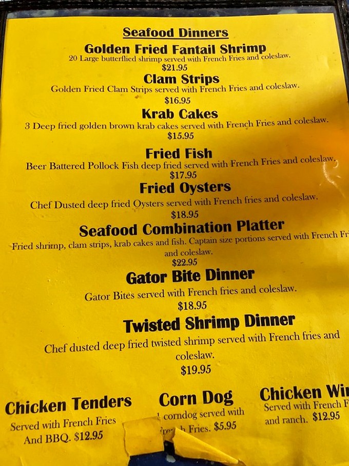This sunshine-yellow menu is a maritime map to happiness. Each line promises another seafood adventure, from fantail shrimp to gator bites&mdash;Florida on a plate!