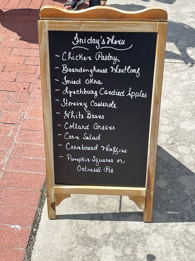A menu board that reads like a love letter to Southern cuisine. Each handwritten item promises comfort that modern fast food can only dream about.