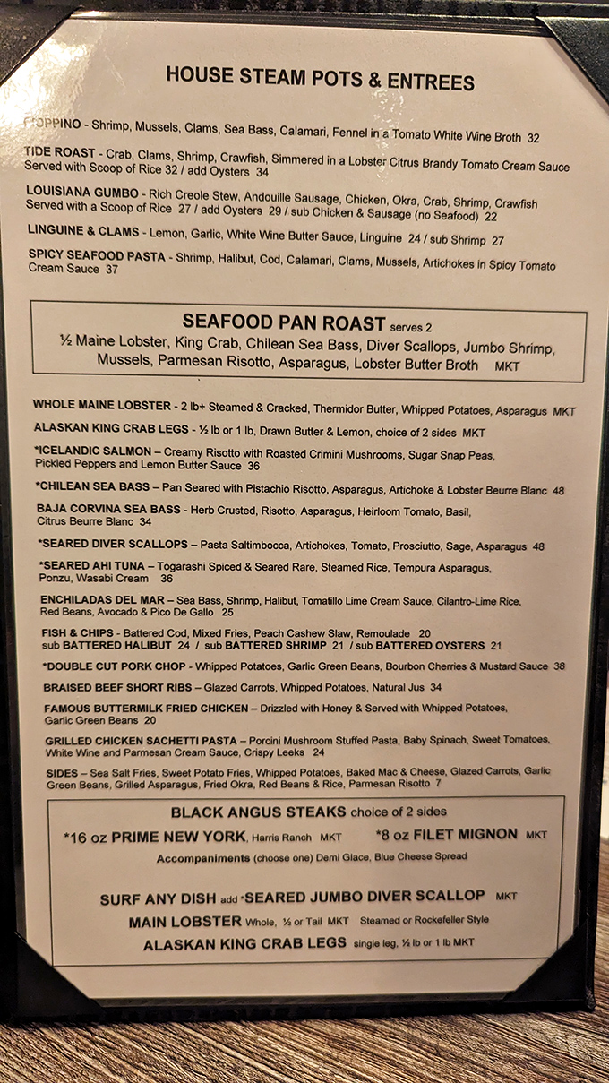 This menu isn't just reading material&mdash;it's a treasure map where X marks the spot for seafood that makes you forget you're in the desert.