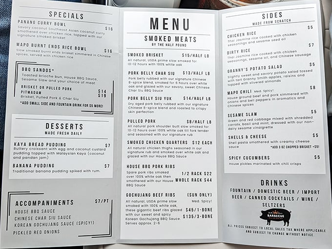 A menu that reads like barbecue poetry. Each description promises smoky delights that bridge Texas tradition with Asian innovation.