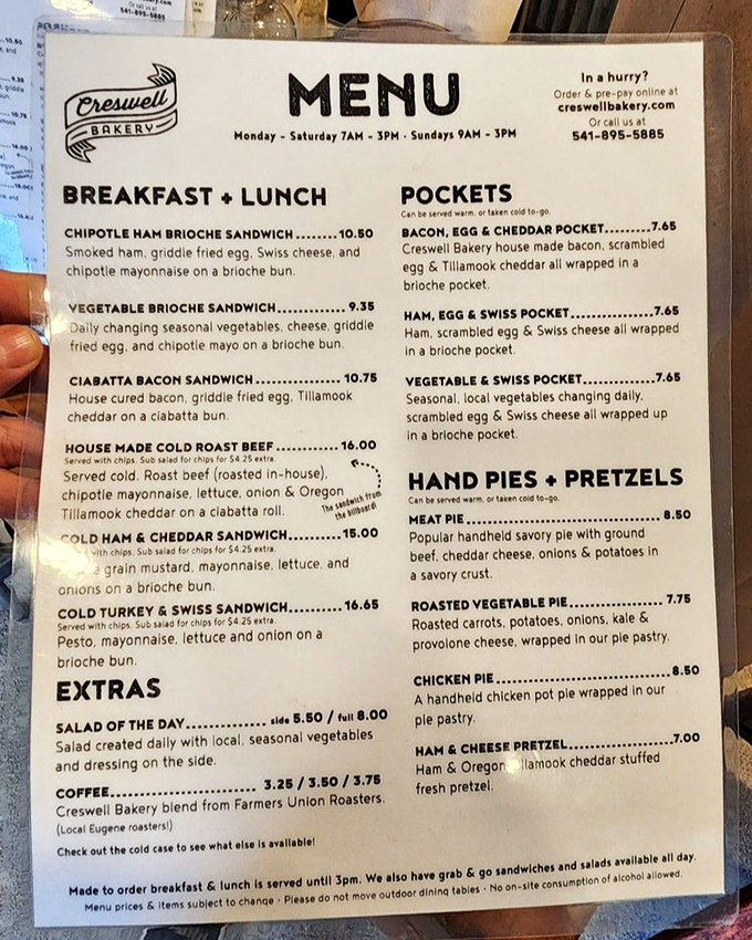 The menu reads like a love letter to comfort food. Each item practically dares you to maintain your composure while ordering.