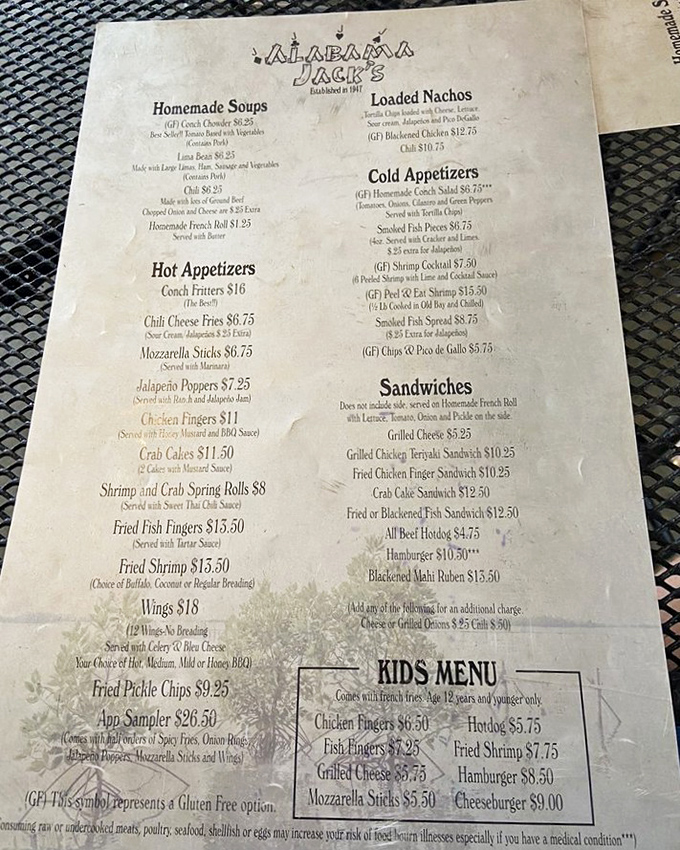 The menu reads like a love letter to the sea, with conch fritters leading the charge of oceanic delights.
