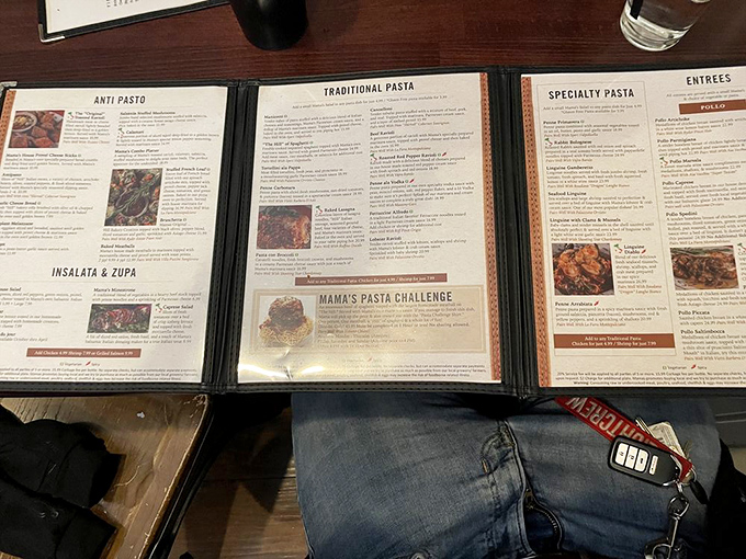 The menu reads like a love letter to Italian-American cuisine, with sections dedicated to pasta, antipasti, and those legendary toasted ravioli.