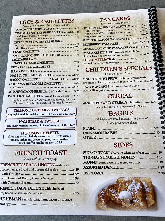 The menu reads like a love letter to American breakfast classics, with the French toast section practically begging for your attention.
