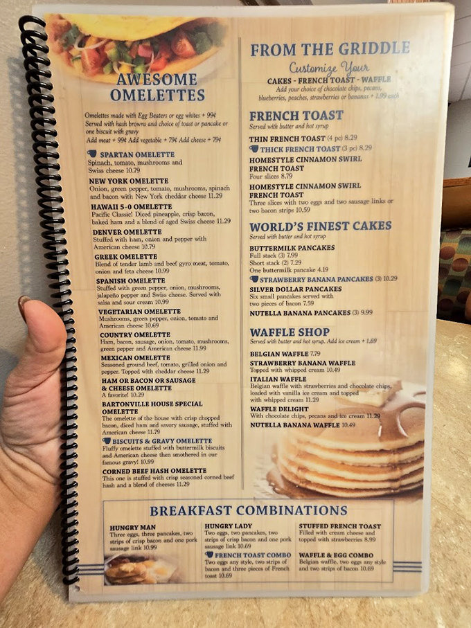 The menu reads like a love letter to breakfast classics, with omelets and pancakes that would make even the most dedicated health enthusiast temporarily abandon their principles.