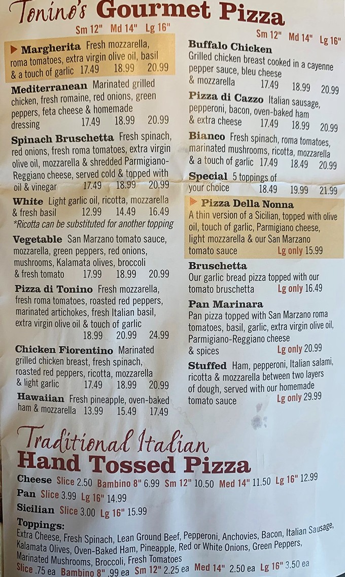 A menu that reads like a love letter to Italian cuisine, where every pizza possibility is laid out with the care of a Renaissance masterpiece.