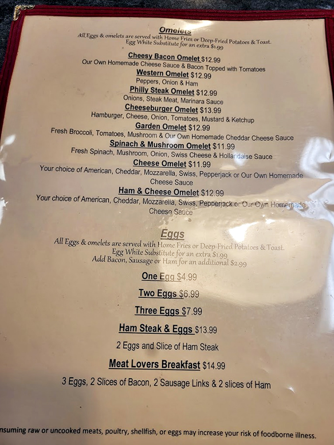 The menu reads like a love letter to breakfast enthusiasts, with that legendary cheddar omelet holding court among equally tempting egg-based masterpieces.