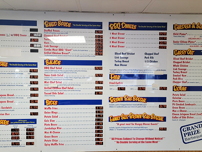 The menu board speaks the universal language of Texas&mdash;meat by the pound, plates by the appetite. No fancy fonts needed.