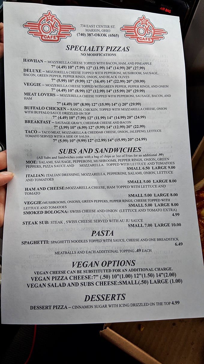 The menu reads like a love letter to pizza enthusiasts—from Hawaiian to Breakfast pizza, with vegan options that don't feel like an afterthought.