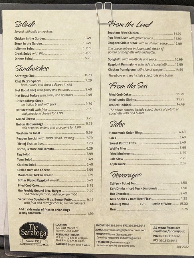 This menu isn't just a list of dishes; it's a roadmap to happiness with landmarks like "From the Sea" and "Sandwiches" guiding your journey.