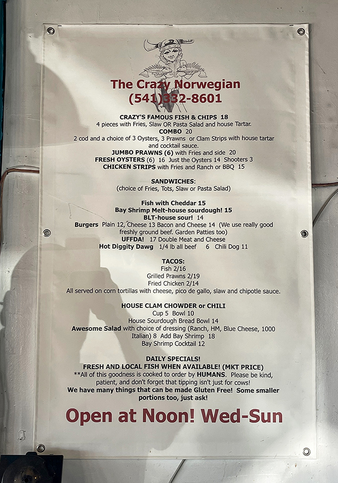 The menu reads like seafood poetry &ndash; "Crazy's Famous Fish & Chips," "House Clam Chowder," and that charming note about being cooked by actual humans.