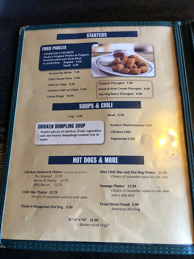 This menu isn't just a list of food&mdash;it's a roadmap to happiness. The "MOA*D" (Mother of All Dogs) isn't just clever marketing; it's a promise.