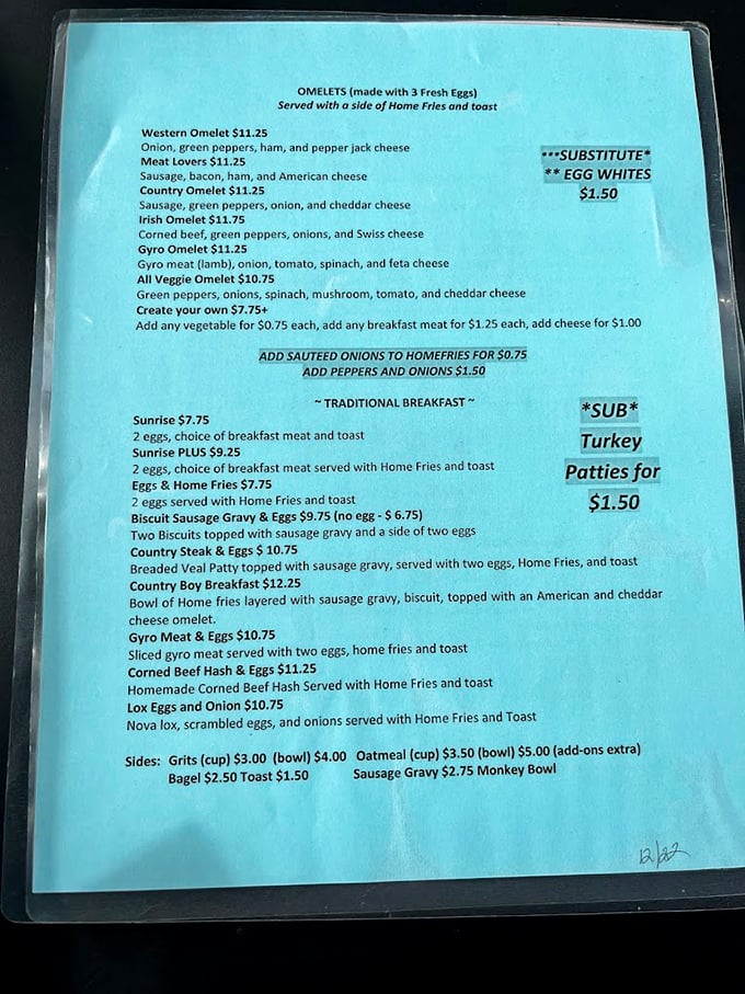 This menu isn't just a list of food&mdash;it's a roadmap to happiness. The "Create Your Own Omelet" section is basically an invitation to become an egg architect.