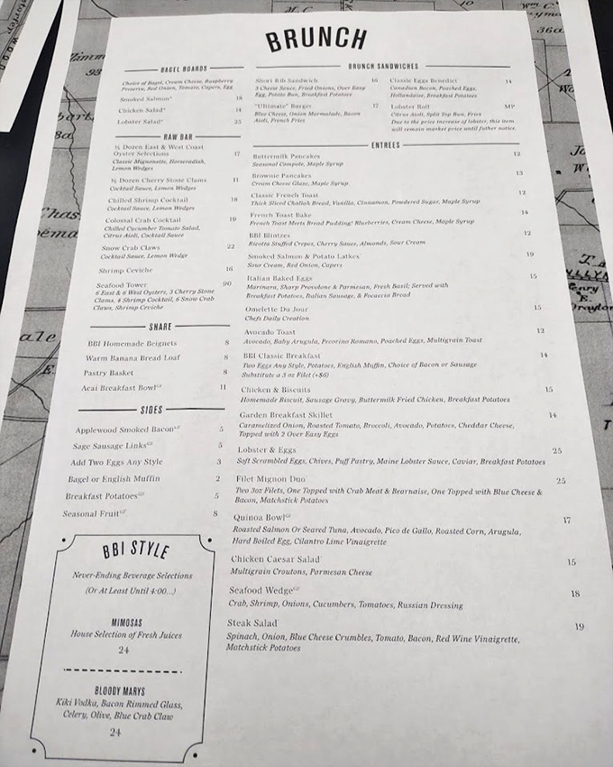 The brunch menu reads like a love letter to morning indulgence. Notice how they don't just serve eggs&mdash;they elevate them with Maine lobster sauce.