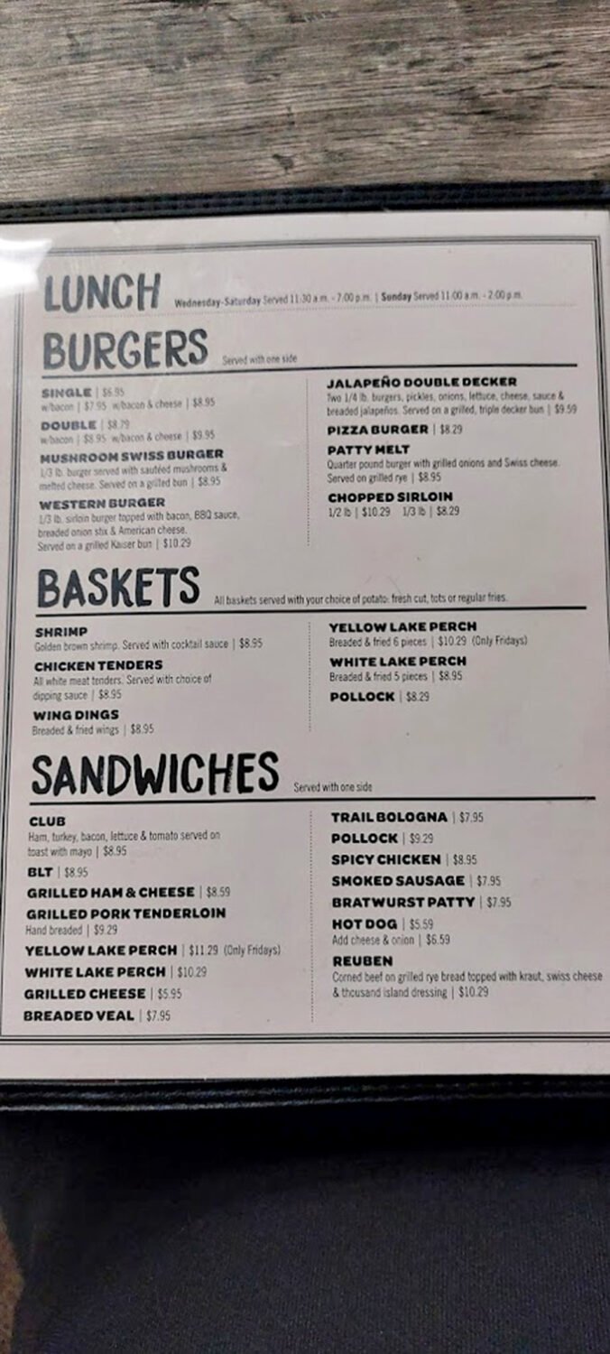 The menu reads like a love letter to American comfort food. No molecular gastronomy here, just dishes your grandmother would recognize and approve.
