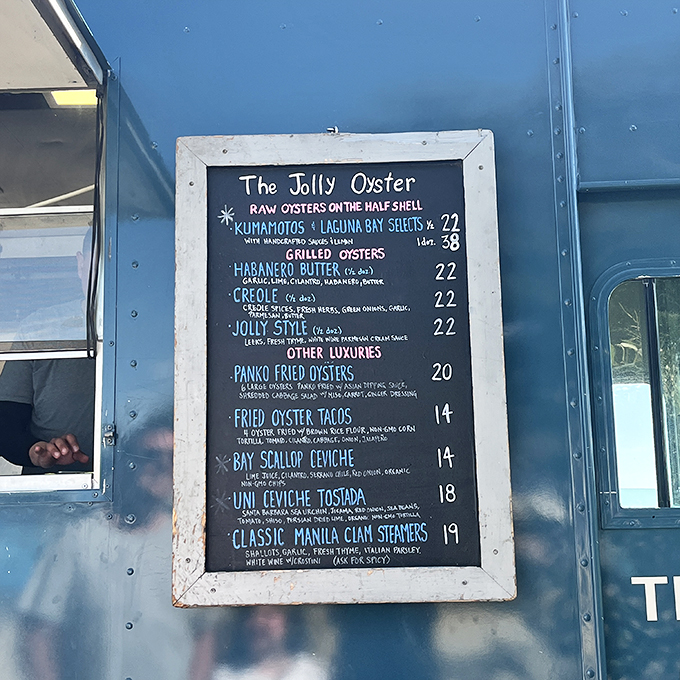 A chalkboard menu that reads like poetry to seafood lovers. Each line promises a different path to briny bliss.