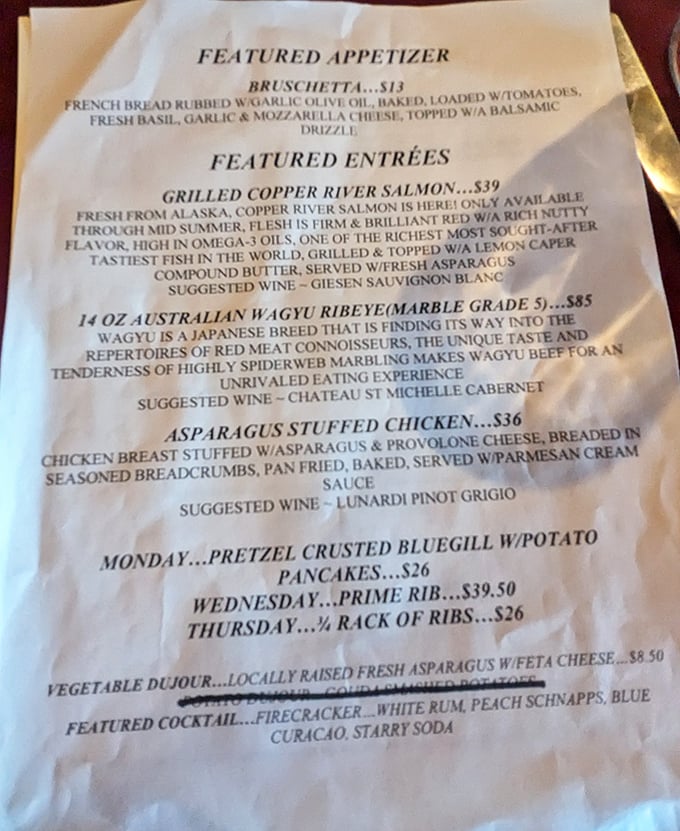 A menu that reads like poetry to the hungry. The Wednesday prime rib special alone is worth rearranging your entire week's schedule.