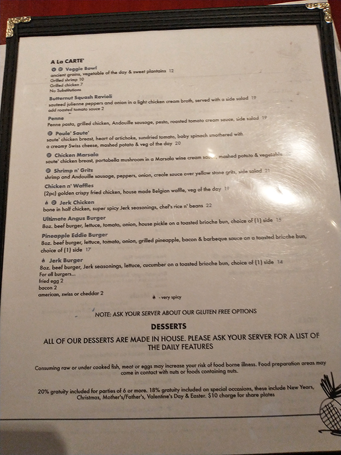 A menu that reads like a love letter to Southern cuisine with Caribbean flair. Each description promises a flavor journey worth taking.