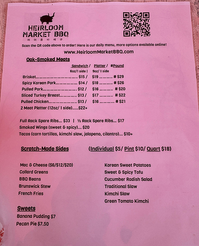 The iconic pink menu &ndash; a roadmap to smoked meat nirvana. Notice how "Spicy Korean Pork" sits proudly alongside traditional Southern classics.