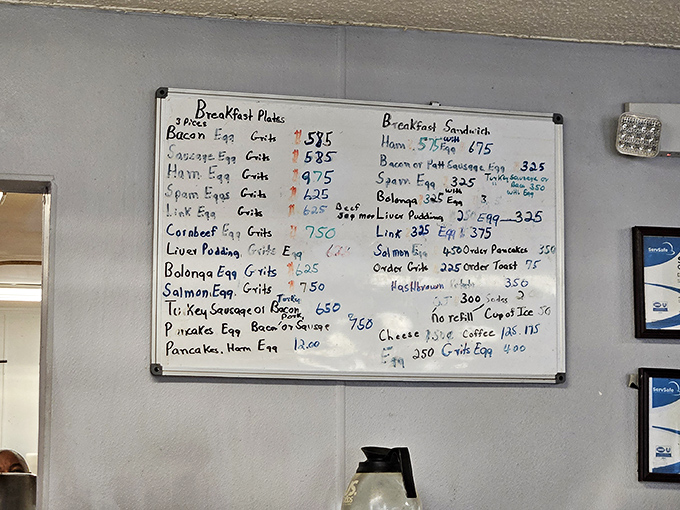 This handwritten menu board is a roadmap to happiness. Breakfast plates with grits tell you you're firmly in Southern territory.