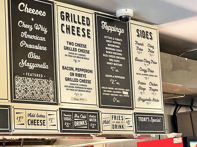 The menu board&mdash;a masterpiece of minimalism. No fancy descriptions needed when you've perfected the basics.