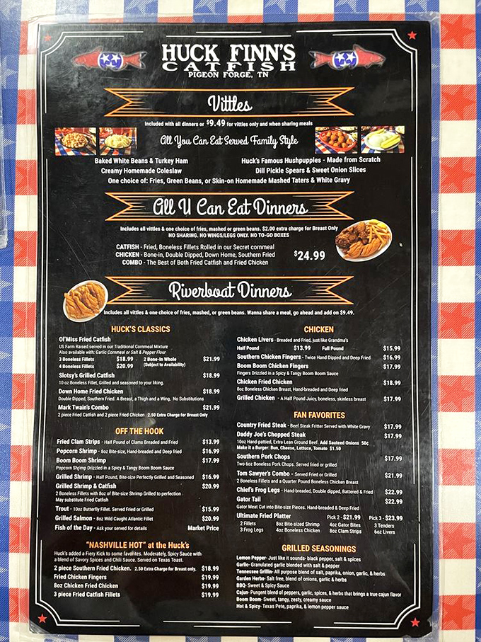 The menu board tells the whole delicious story: "All U Can Eat" isn't just a promise, it's practically a dare at Huck Finn's Catfish.
