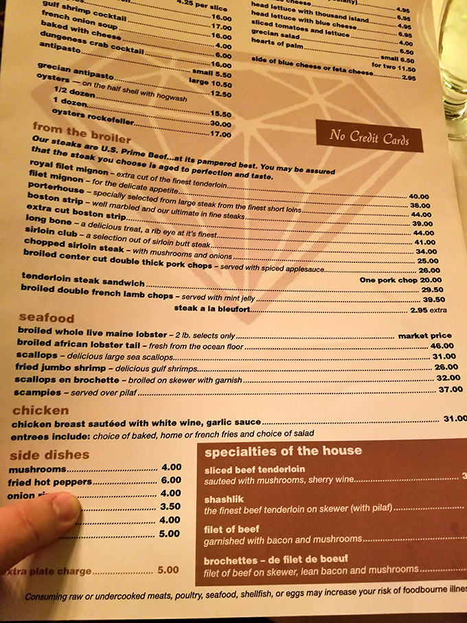 A menu that doesn't need emojis or QR codes to impress. When "No Credit Cards" is printed right on the menu, you know they're serious about tradition.