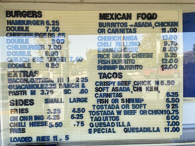 A menu board that reads like poetry to the hungry. Two culinary traditions&mdash;American classics and Mexican favorites&mdash;living harmoniously on one glorious wall.