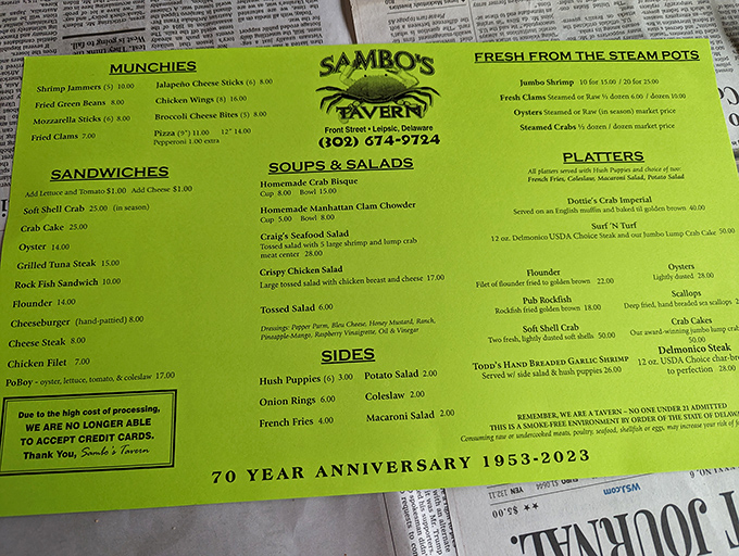 That bright green menu is like a treasure map where X marks the spot for some of Delaware's finest seafood offerings.