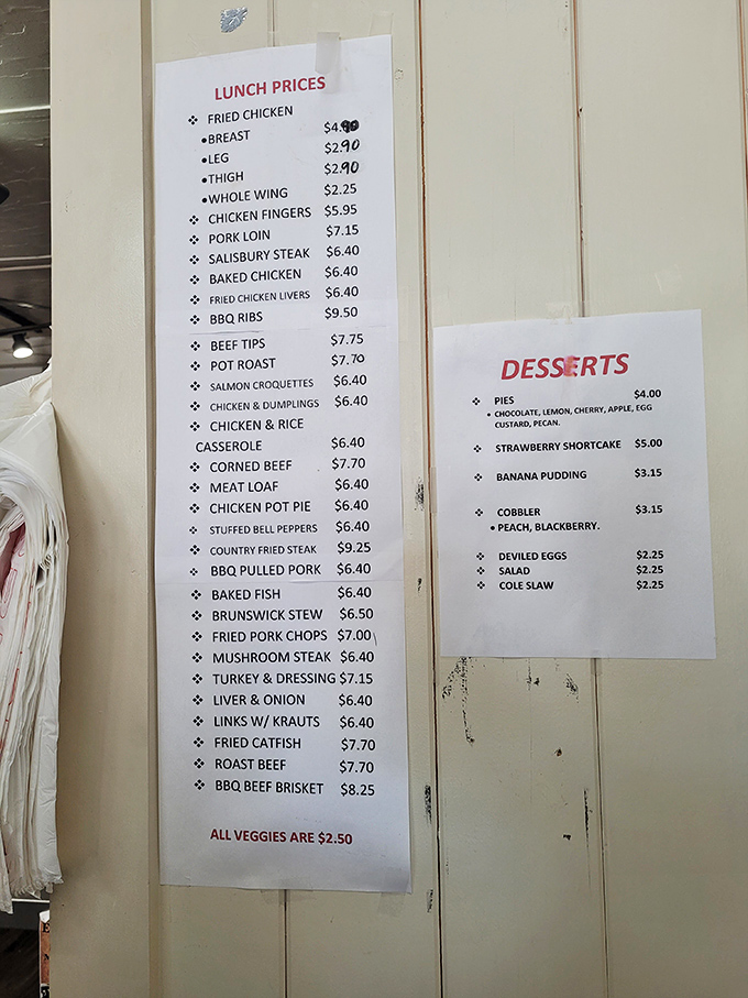 The menu board&mdash;a sacred text of Southern cuisine where mac and cheese rightfully claims its place as a vegetable.