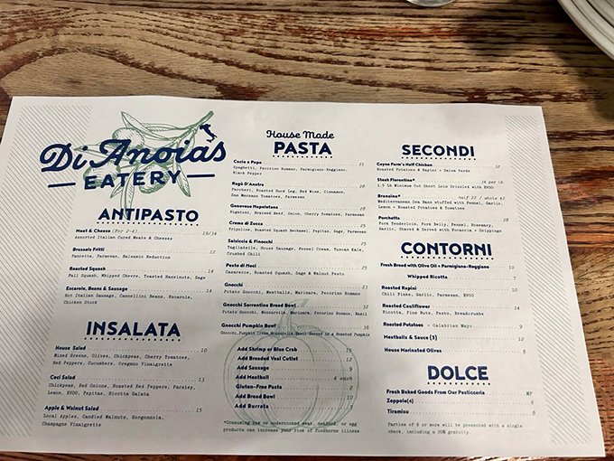 The menu reads like a love poem to Italian cuisine, with each section promising delights that would make your nonna weep with joy.