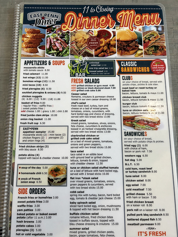 The menu reads like a love letter to American comfort food. Each spiral-bound page promises satisfaction that chain restaurants can only dream about.