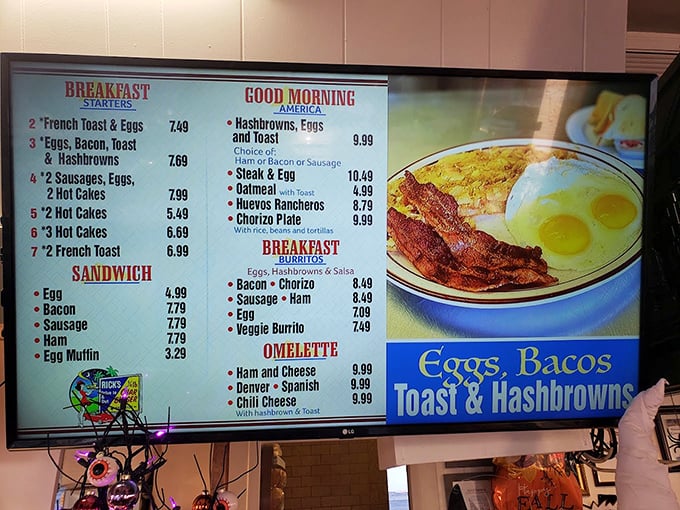 The breakfast menu board promises morning salvation with everything from huevos rancheros to classic American combos.