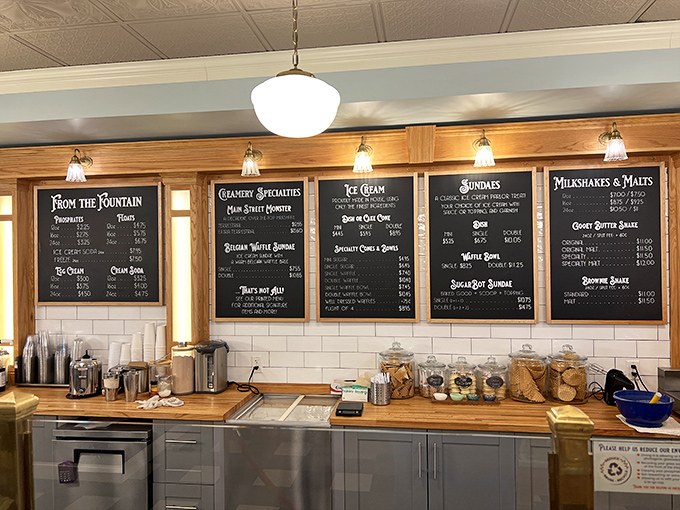 The menu board isn't just a list&mdash;it's a roadmap to happiness with destinations like "Milkshakes & Malts" and the promised land of "Sundaes."