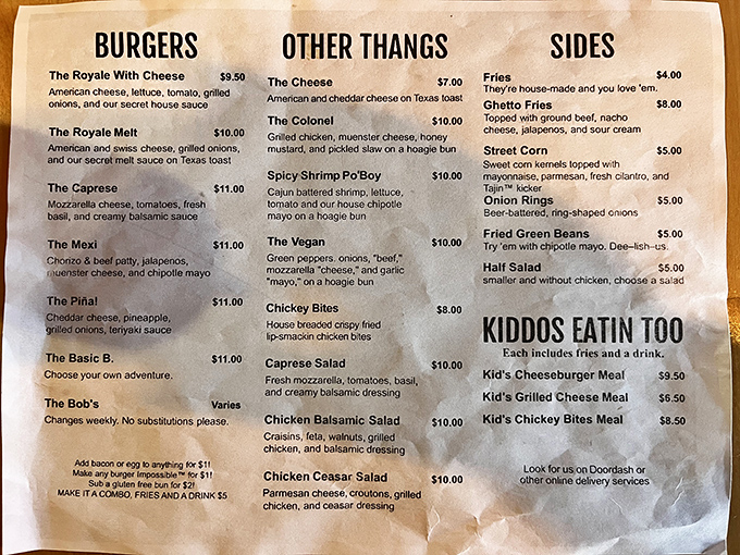 A menu that doesn't need novels to impress. From the namesake Royale With Cheese to those legendary Ghetto Fries, simplicity meets culinary swagger.