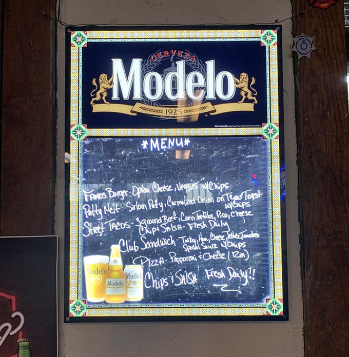 The chalkboard menu, framed by a Modelo sign, offers no pretense &ndash; just honest food that makes people drive for hours through the Hill Country.