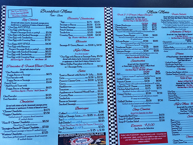 That classic blue diner menu with its checkerboard border &ndash; where breakfast is served all day because pancakes don't care what time it is.