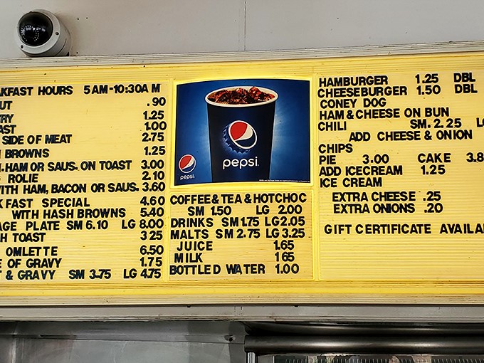 This menu board tells you everything you need to know: breakfast until 10, burgers all day, and prices that won't make your wallet weep.