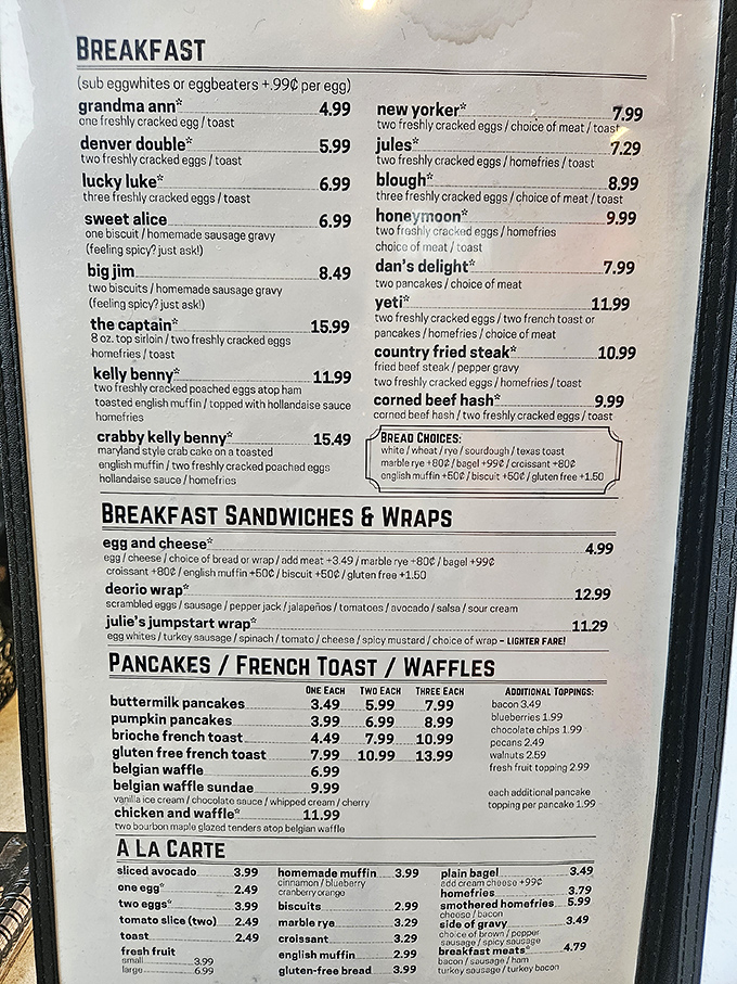 This menu reads like a love letter to breakfast enthusiasts. The Crabby Kelly Benny beckons from the page, while playfully named dishes promise morning adventures.