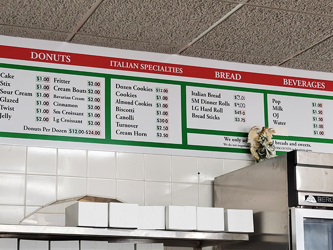 The menu board tells you everything you need to know: life is short, eat the cannoli. And the donuts. And definitely the cream horns.