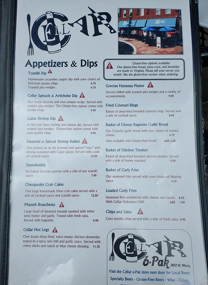 A menu that reads like a love letter to Mediterranean cuisine, with those little triangles marking gluten-free options for modern appetites.