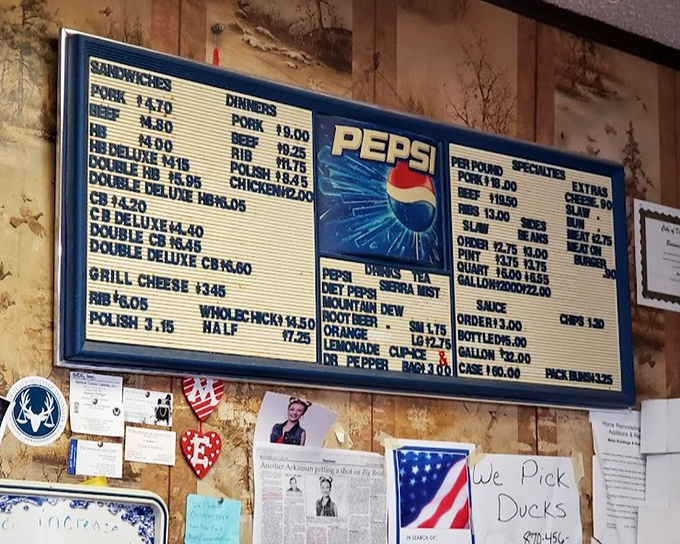 The menu board speaks the universal language of BBQ devotees: simple options, reasonable prices, and "We Pick Ducks" wisdom.
