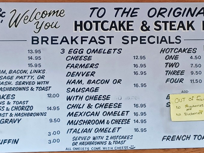 The menu board reads like a love letter to breakfast classics. That little yellow "Out of..." note? Just adds to the authentic charm.